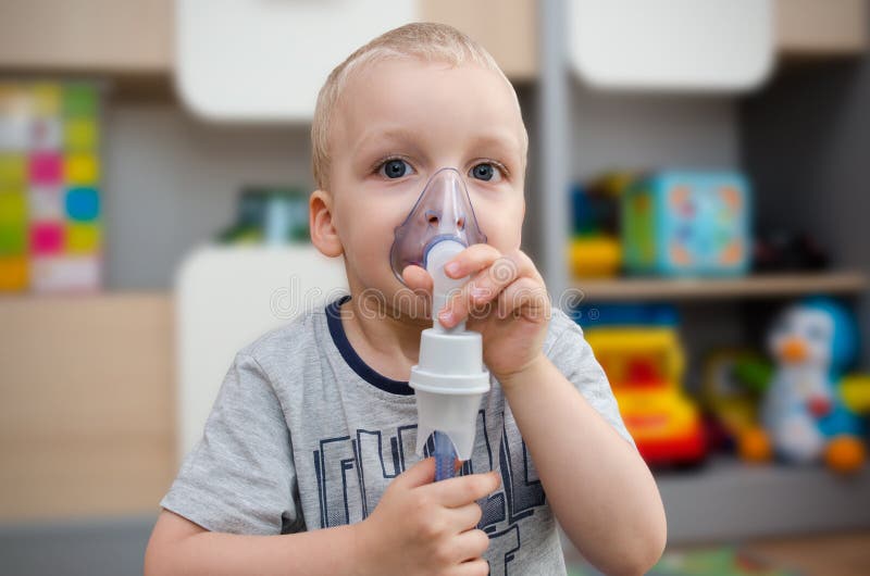 Child Making Inhalation with Mask on His Face. Stock Image - Image of ...