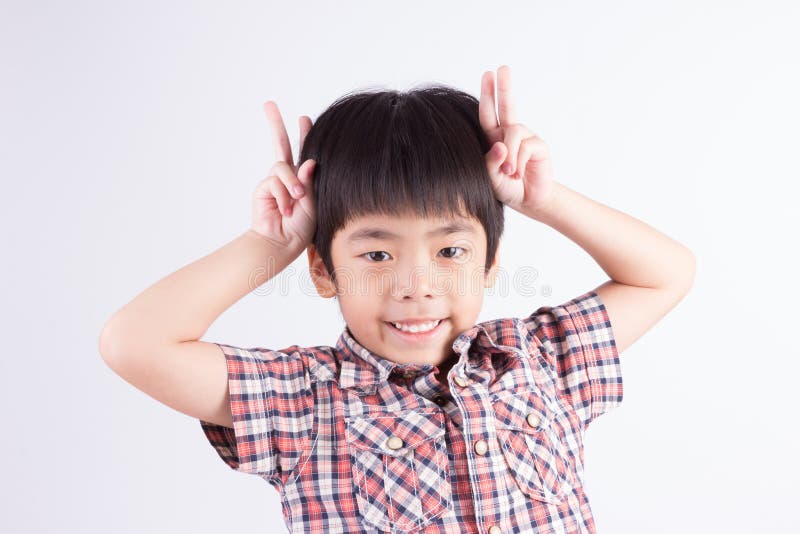 Child Making Peace Sign stock image. Image of sign, white - 34873751