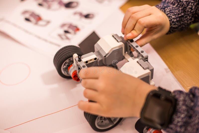 Child Making Robot Machine. Hobby Concept Stock Photo - Image of ...