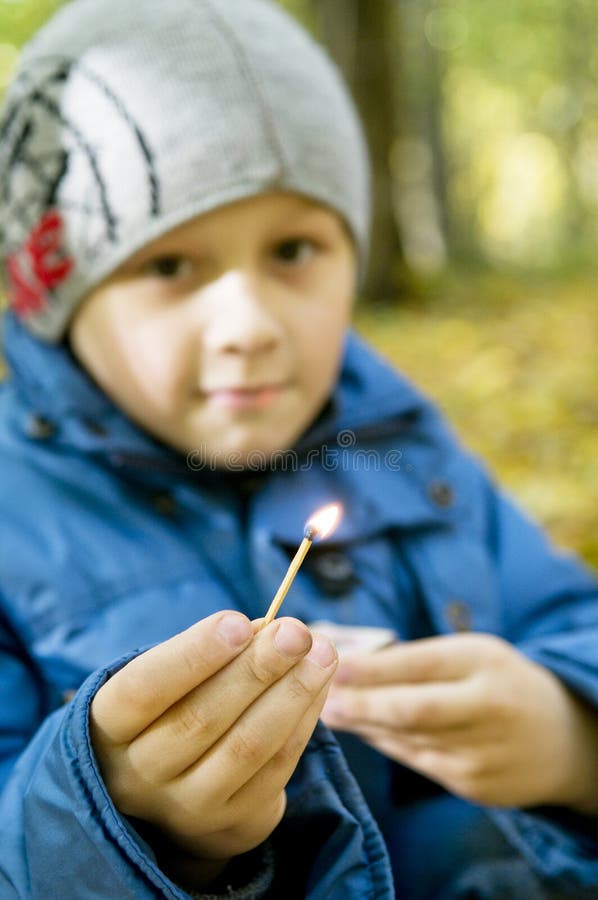 Child with a match stock photo. Image of game, match - 11339438