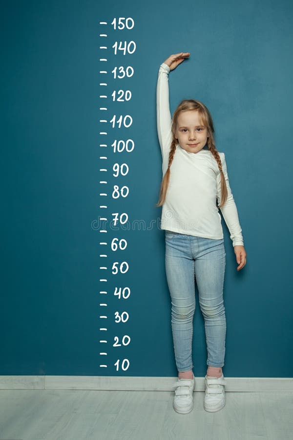 Child measure height stock photo. Image of blue, height - 248259336