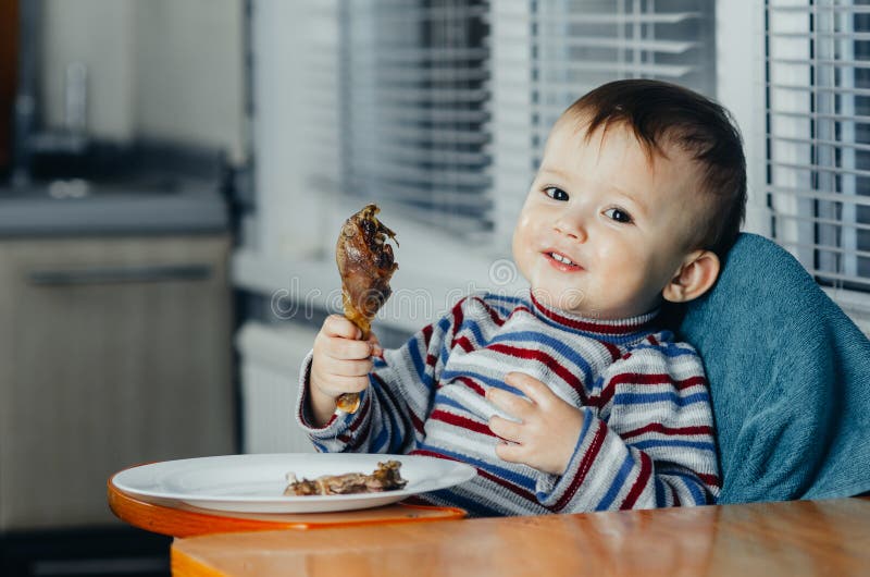Child meat in the hands stock photo. Image of grimacing - 84852046