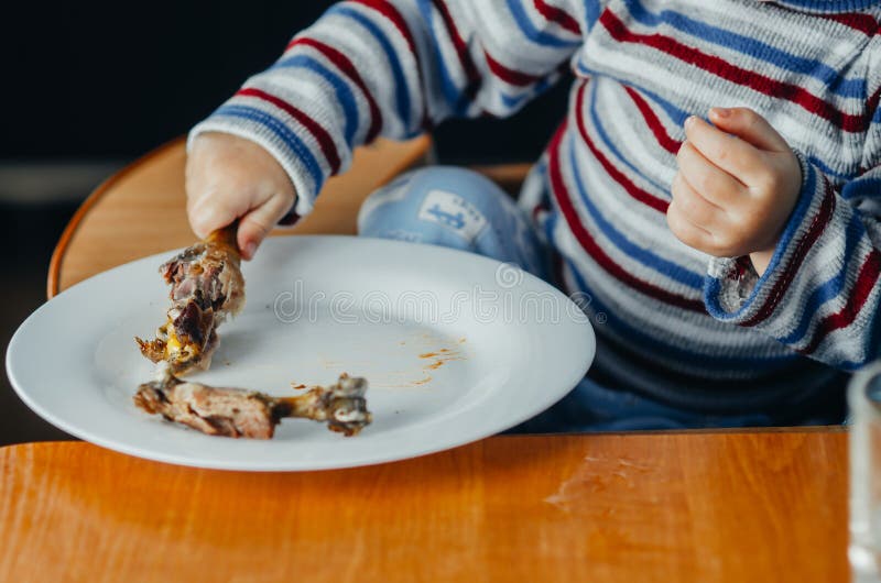 Child meat in the hands stock photo. Image of grimacing - 84852046