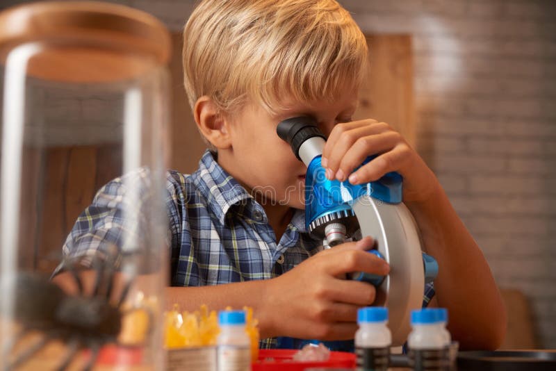 Child with microscope stock photo. Image of microscope - 83253546