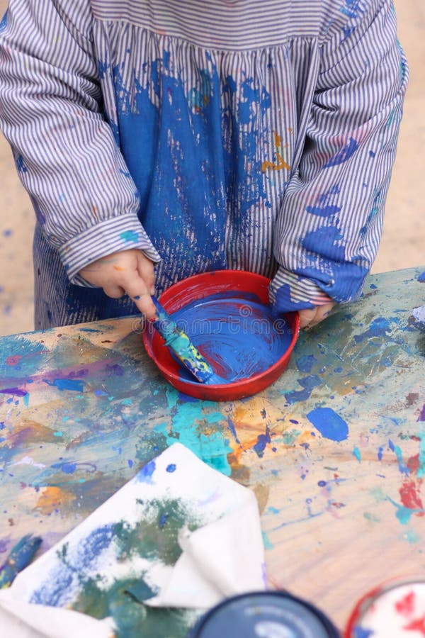 Child Mixing Paint in a Bowl at School Stock Image - Image of beautiful ...