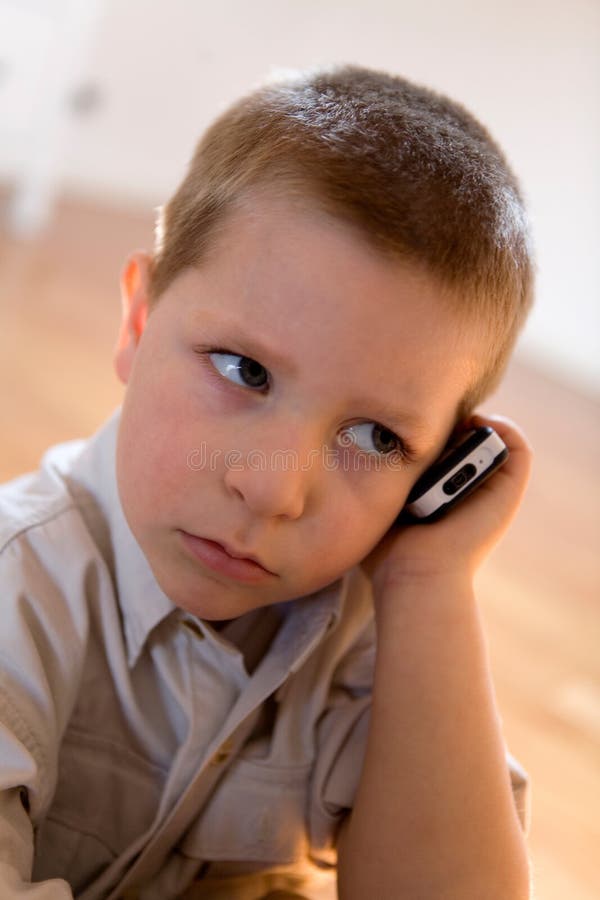 Child with a mobile phone stock image. Image of phone - 2317429