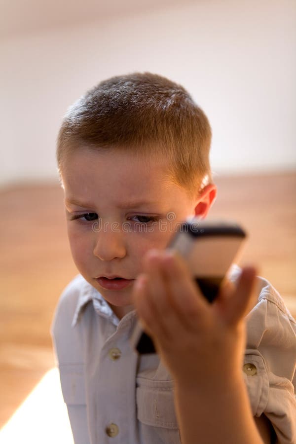 Child Texting stock photo. Image of male, looking, vertical - 21370998