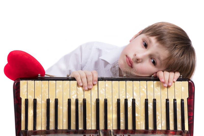 Child with a Musical Instrument. Stock Image - Image of beautiful ...