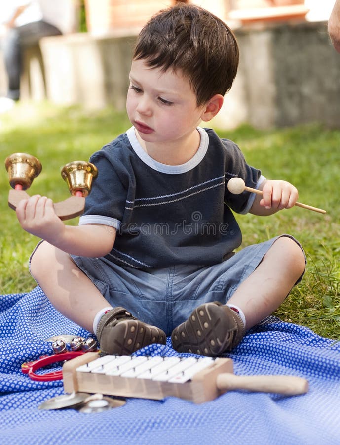 105 Toddler Playing Musical Instruments Stock Photos - Free & Royalty ...