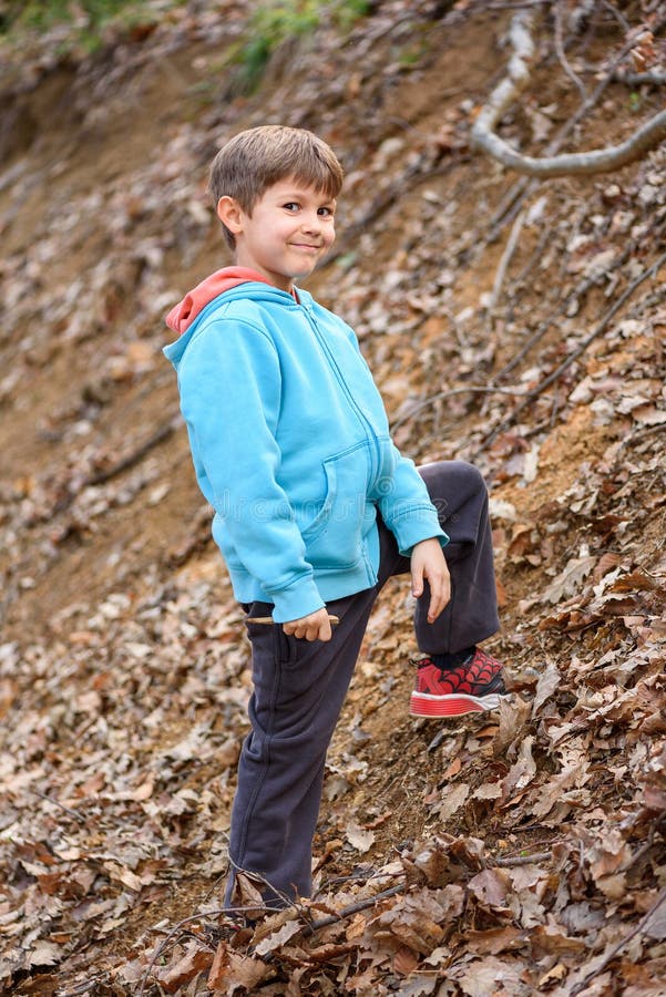 Child and Nature. a Beautiful Boy in the Forest. Stock Photo - Image of ...