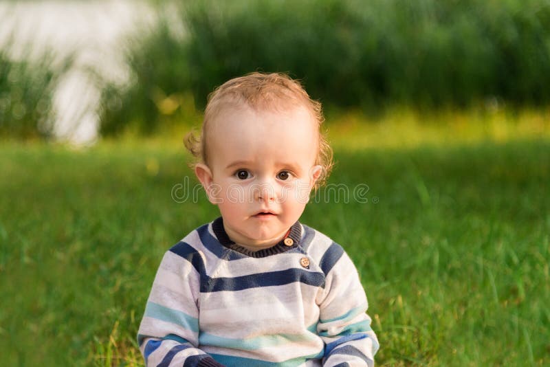 A Child in Nature. Cheerful Boy in Nature Stock Photo - Image of ...
