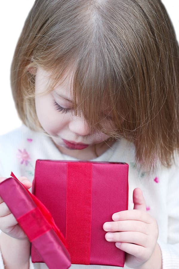Child Opening Gift stock photo. Image of conceptual, holds - 13640780