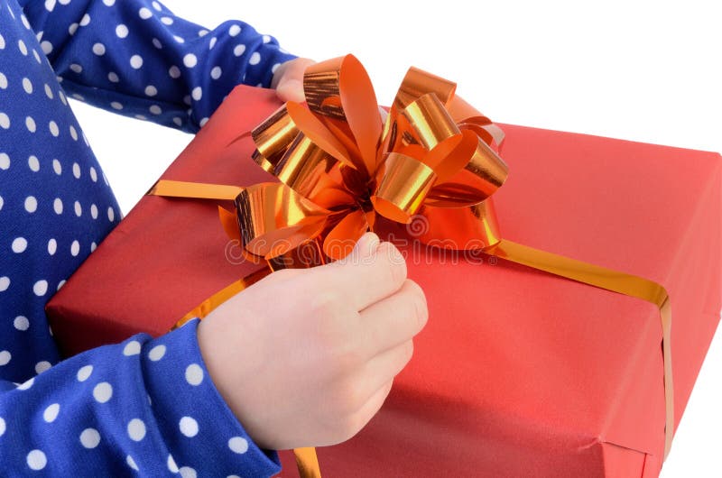 Child opens Gift red box stock photo. Image of holiday - 66432094
