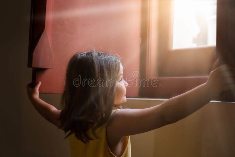 The Child Opens the Window Shutters Stock Photo - Image of light ...