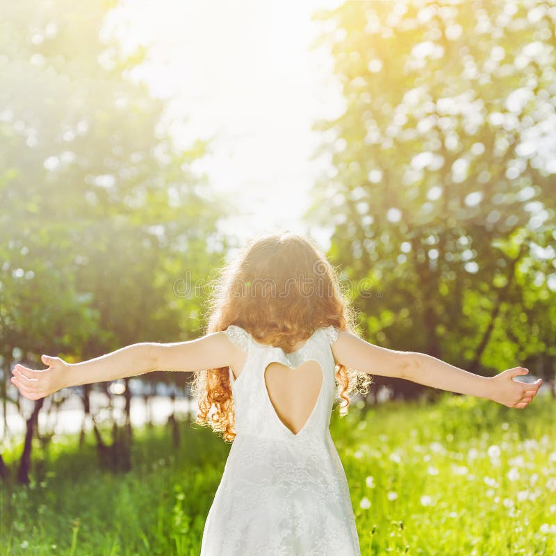 Child Outstretched Arms Enjoying Fresh Air and Sunlight. Stock Photo ...