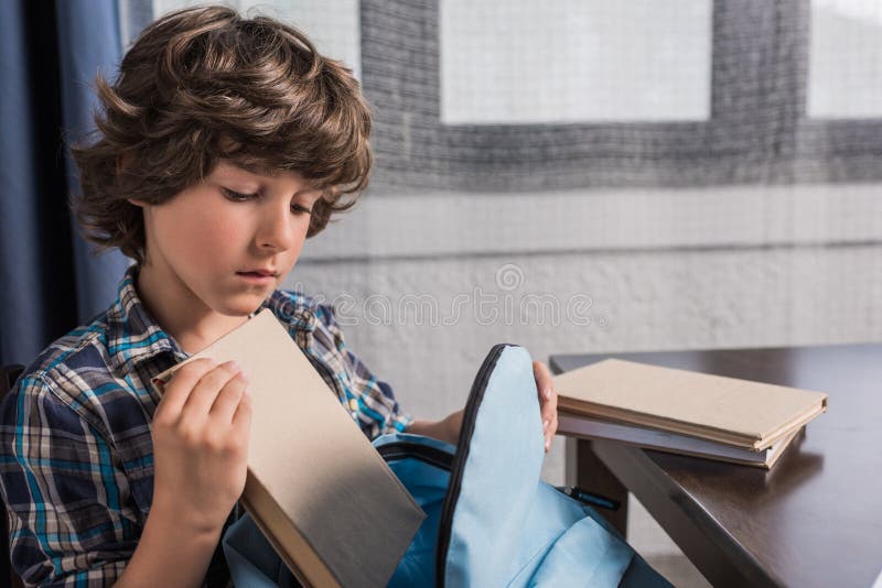 Child Packing Backpack for School Stock Image - Image of books, hold ...