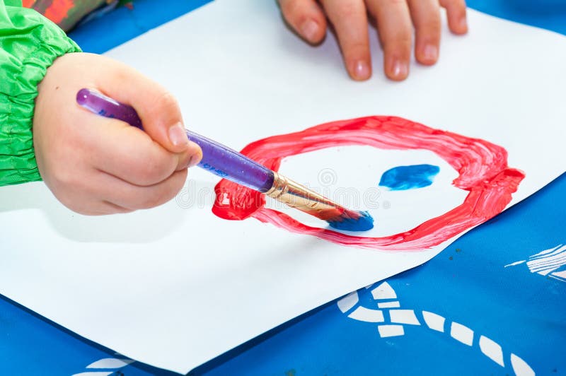 Child painting with brush stock photo. Image of brush - 45593980