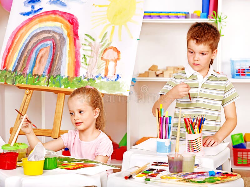Child painting at easel. stock photo. Image of creativity - 27184262