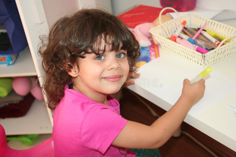 Child is painting on paper stock photo. Image of person - 22106232