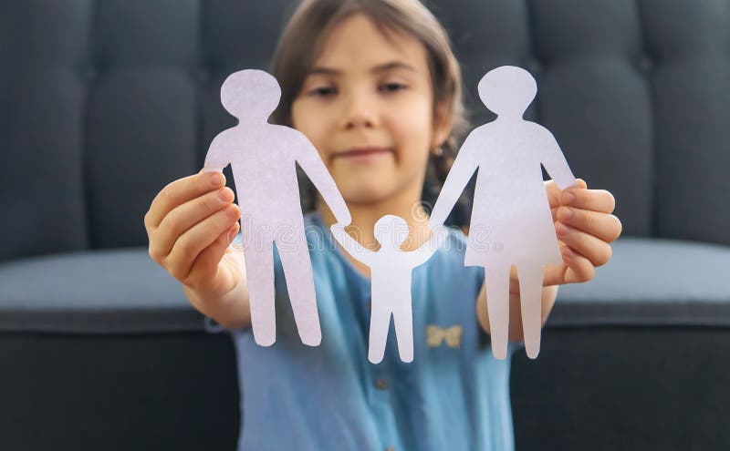 Child with a Paper Family in His Hands. Selective Focus Stock Image ...