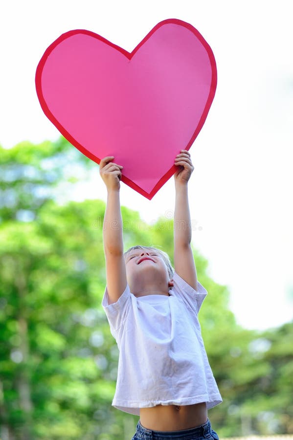 Child holding heart stock photo. Image of happiness, child - 17218720