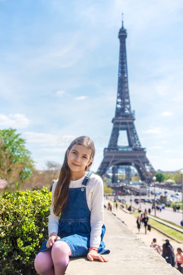 Child in Paris Near the Eiffel Tower. Selective Focus Stock Photo ...