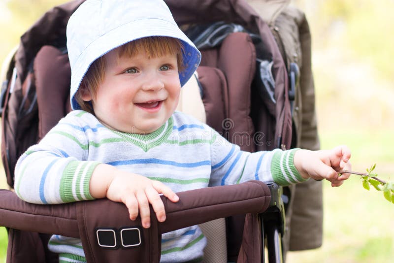 Child in the perambulator stock image. Image of belt - 24502423
