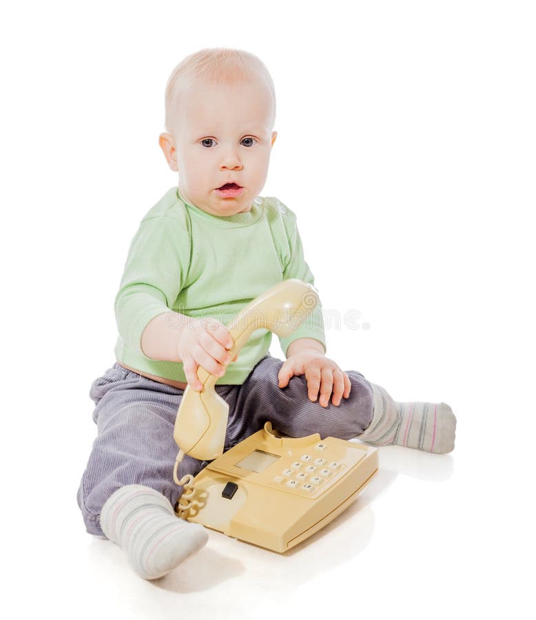 Child on phone stock image. Image of pensive, sitting - 85761115