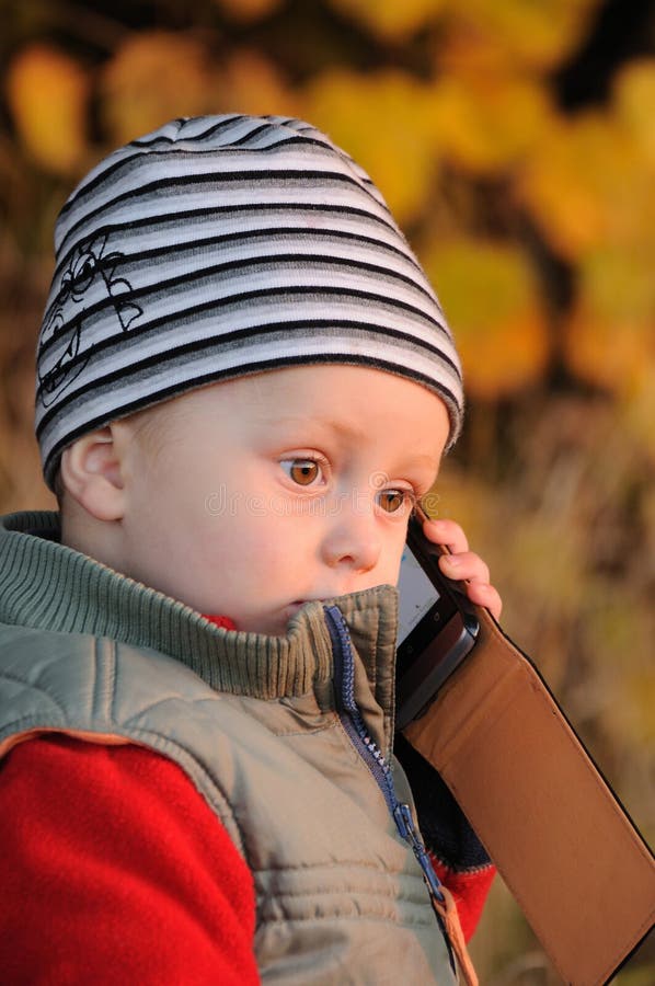 Child phone stock photo. Image of caucasian, holding - 34562366