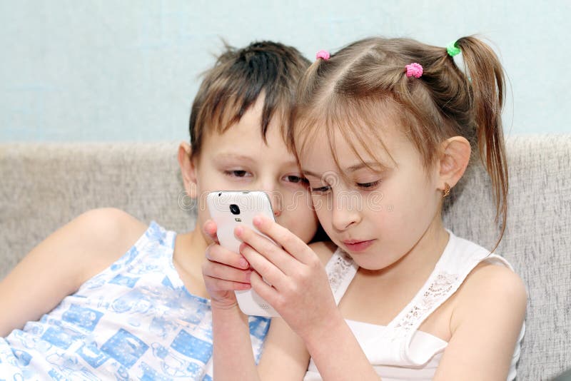 Child and phone stock image. Image of children, pigtails - 63713363