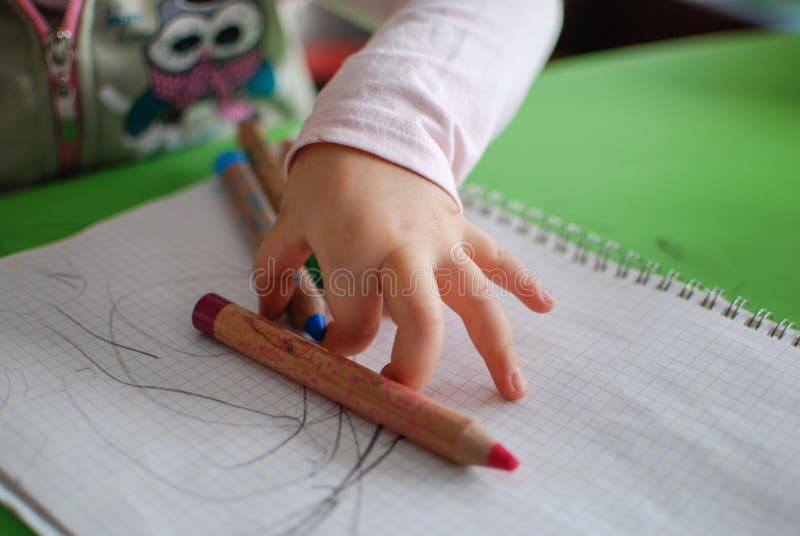 Child Picking a Coloring Pencil Stock Photo - Image of hand, playing ...