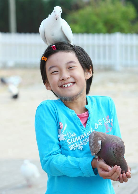 Child and pigeon stock photo. Image of baby, beauty, asian - 6695568