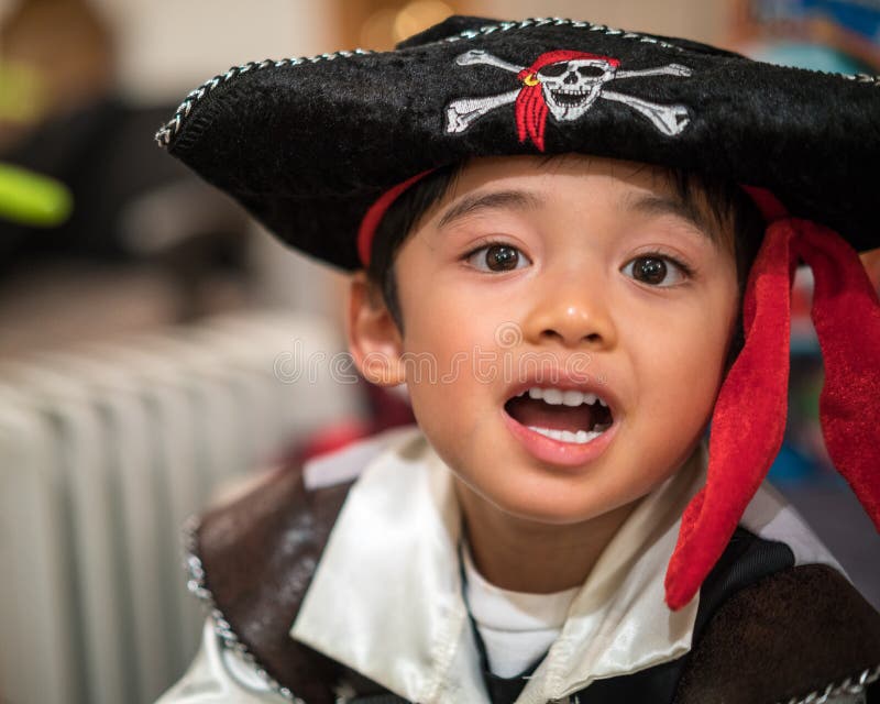 Child in a pirate costume stock photo. Image of belt - 61628852