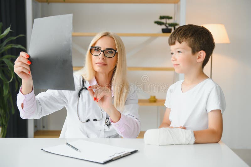 A Child with a Plaster on His Hand at Clinic Stock Photo - Image of ...