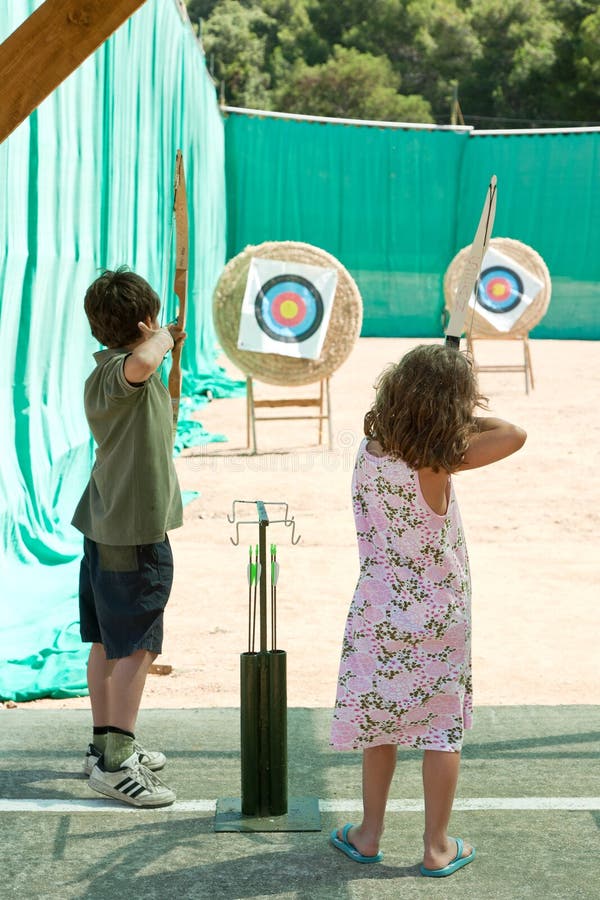 Child play archery stock photo. Image of vacation, sister - 26146406