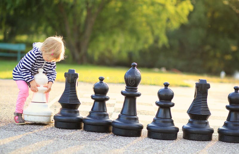 Child Play Chess Figures Outdoor Stock Image - Image of chessboard ...