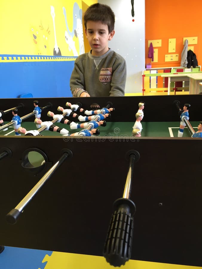 Child play foosball stock image. Image of entertiment - 48564169