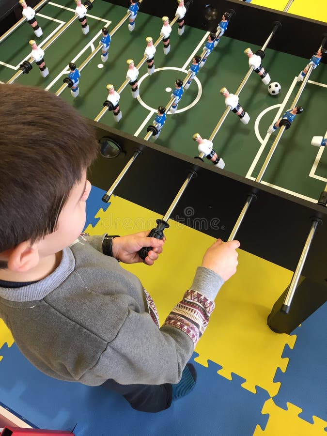 Child play foosball stock photo. Image of table, product - 48564176