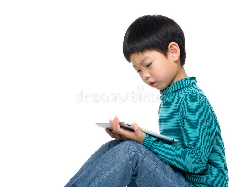 Child play game on tablet stock image. Image of education - 40715961