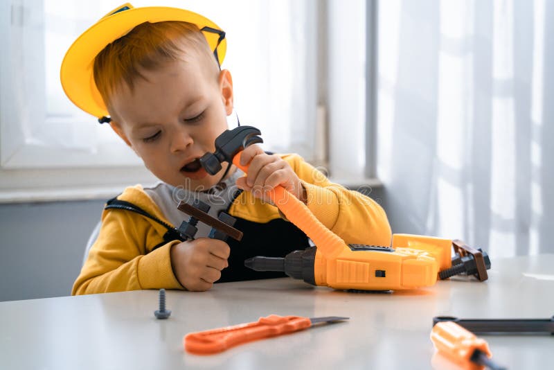 Boy Play As Builder or Repairer, Work with Tools. Childhood Concept ...
