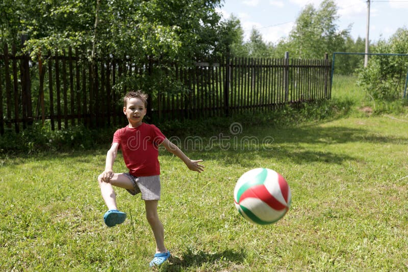 Child playing with ball stock photo. Image of entertainment - 120328868