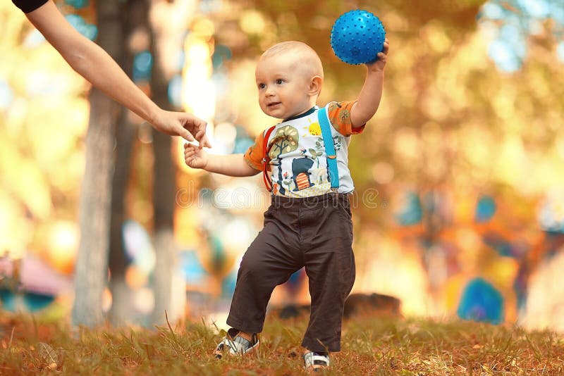 Child Playing with Ball in Park Stock Photo - Image of child, ball ...
