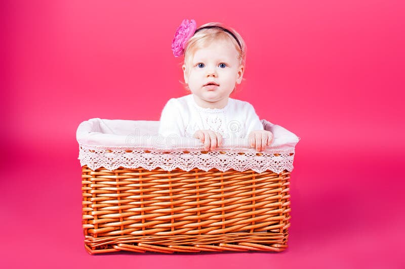 Child playing in a basket stock photo. Image of daughter - 23636912