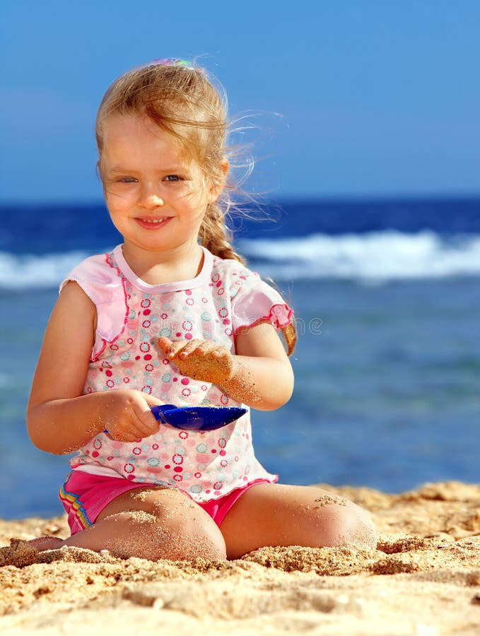 Child playing on beach. stock photo. Image of playing - 18796342