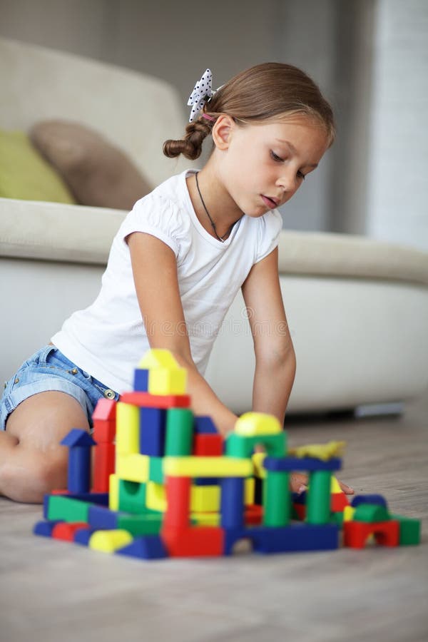Child playing with blocks stock image. Image of assiduous - 35151159