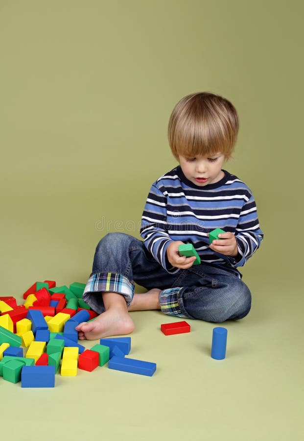 Child Playing with Blocks stock photo. Image of game - 46852976
