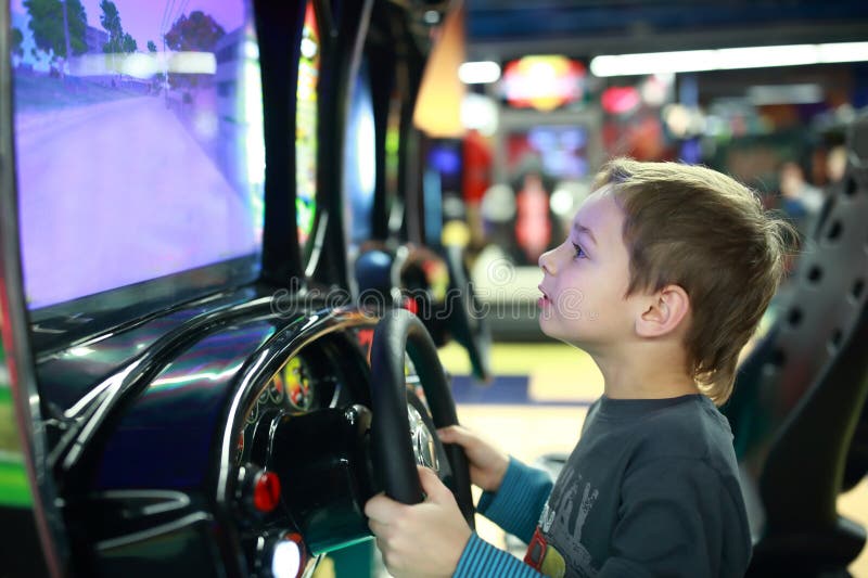 Child Playing in Car Simulator Stock Image - Image of machine ...