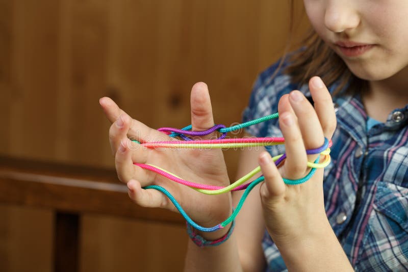 Child Playing Classic String Game, Creating Shapes Stock Image - Image ...
