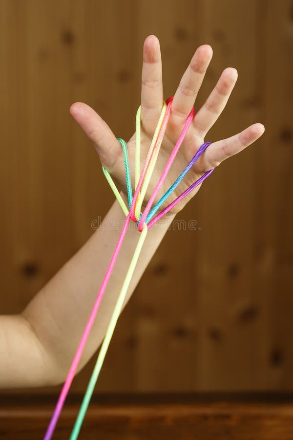 Child Playing Classic String Game, Creating Shapes Stock Image - Image ...