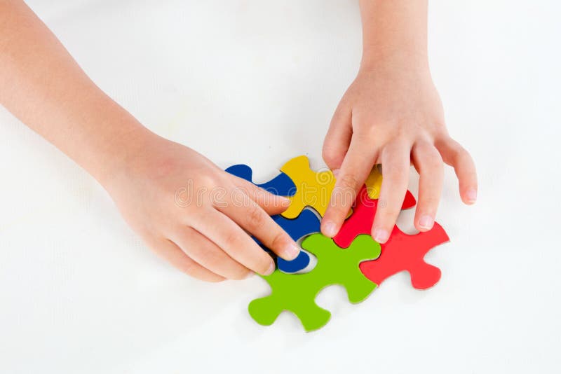 Child Playing Colorful Puzzle Stock Photo - Image of fitting, children ...